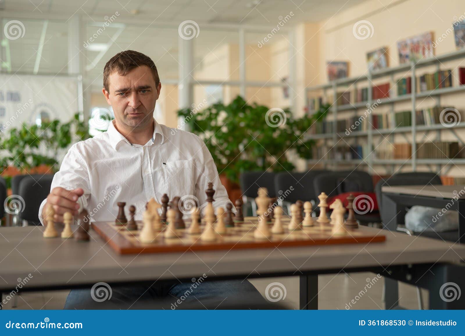 Caucasian Man Thinking about a Chess Move. Stock Photo - Image of ...