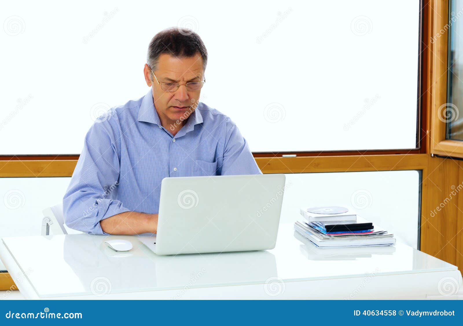 Caucasian Man Working on His Laptop Computer. Stock Photo - Image of ...