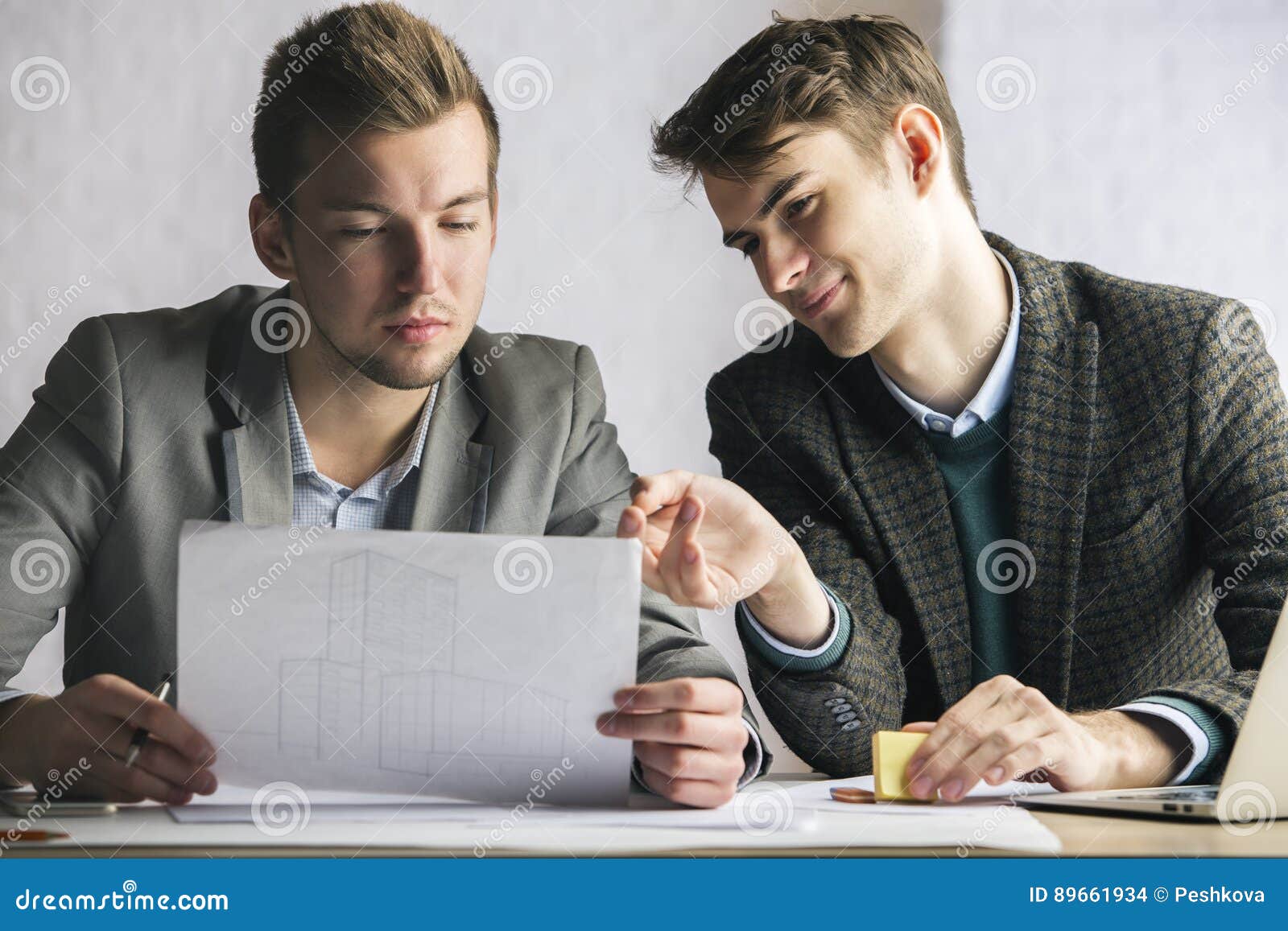 Caucasian Men Doing Paperwork Stock Photo - Image of discussing ...