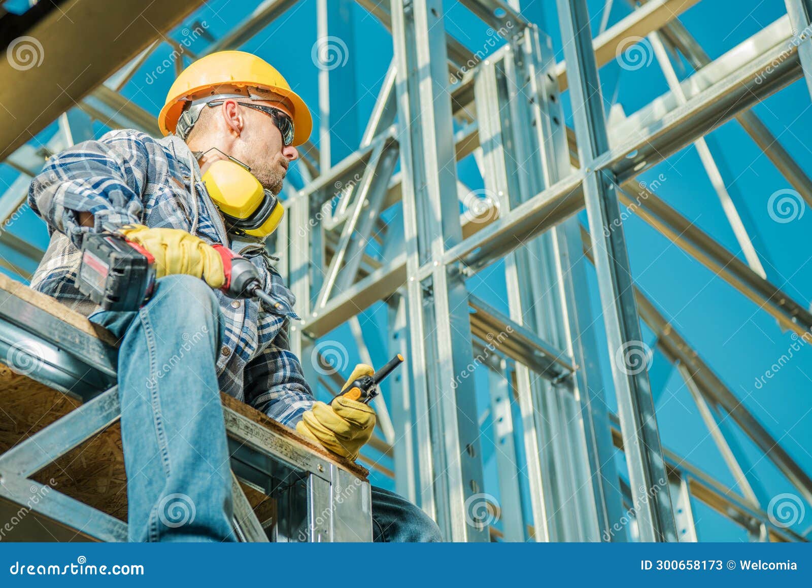 Professional Building Contractor in Front of Skeleton Frame Stock Image ...