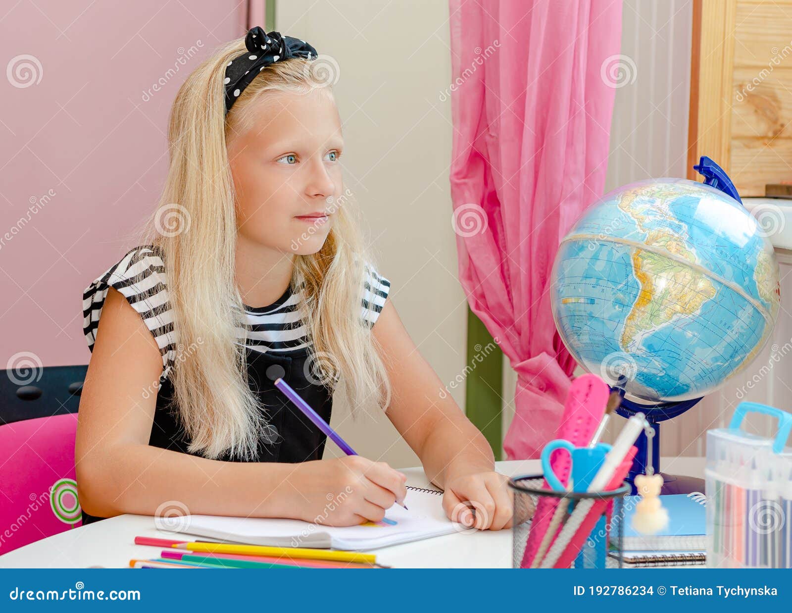Caucasian School Kid Looking at the Window while Studying. Learning at ...
