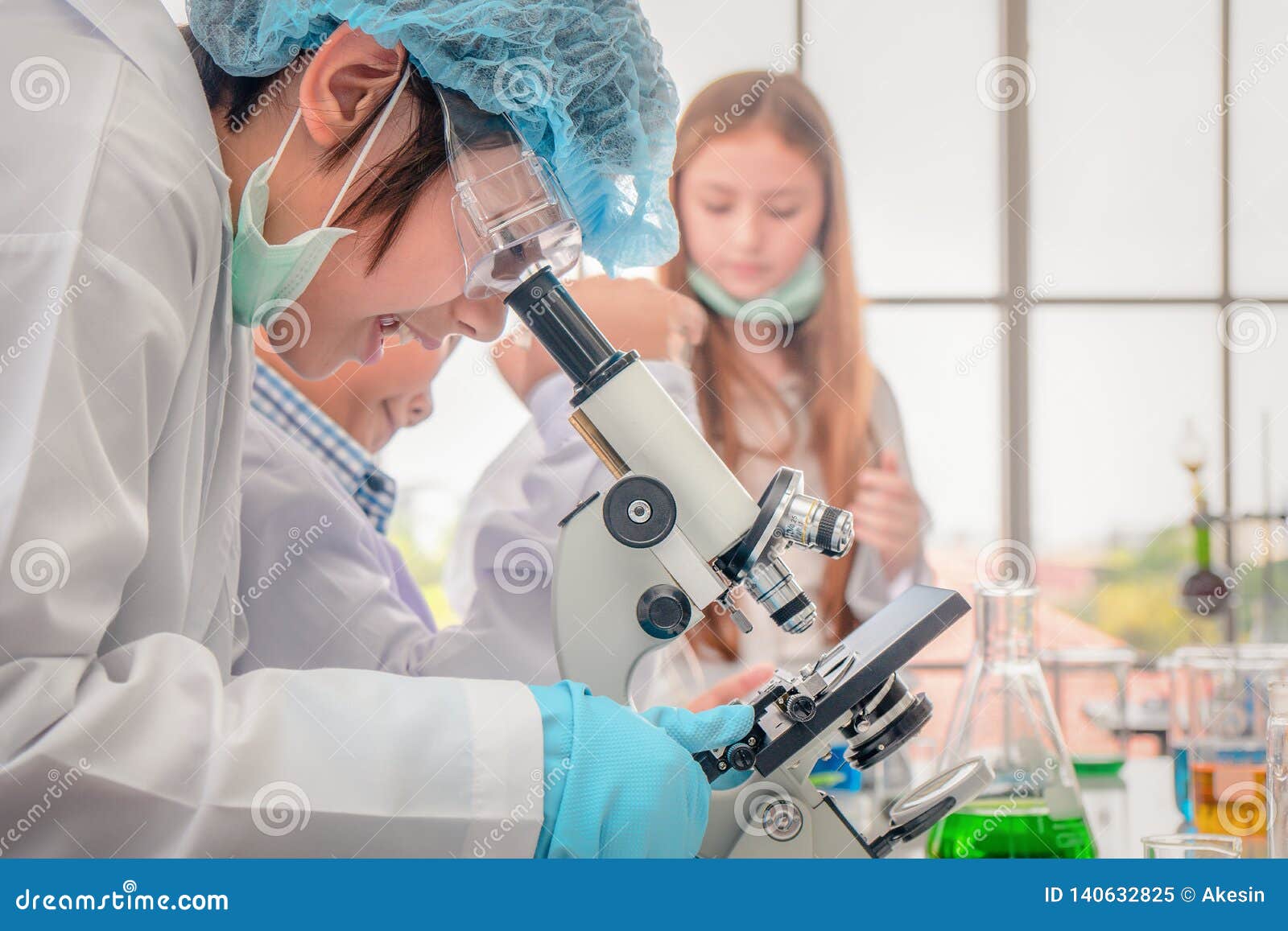 Student Using Microscope in Biology Laboratory Stock Image - Image of ...
