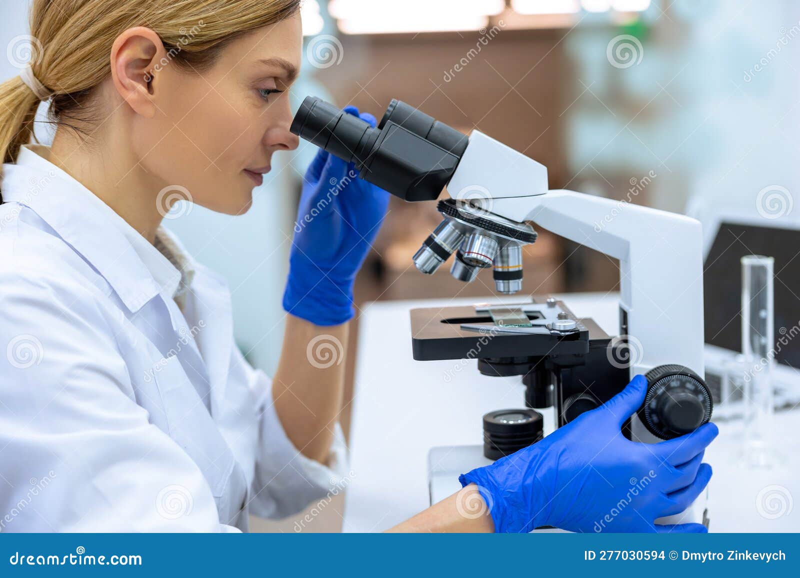 Caucasian Scientist Working in Lab, Making Microbiology Research, Using ...