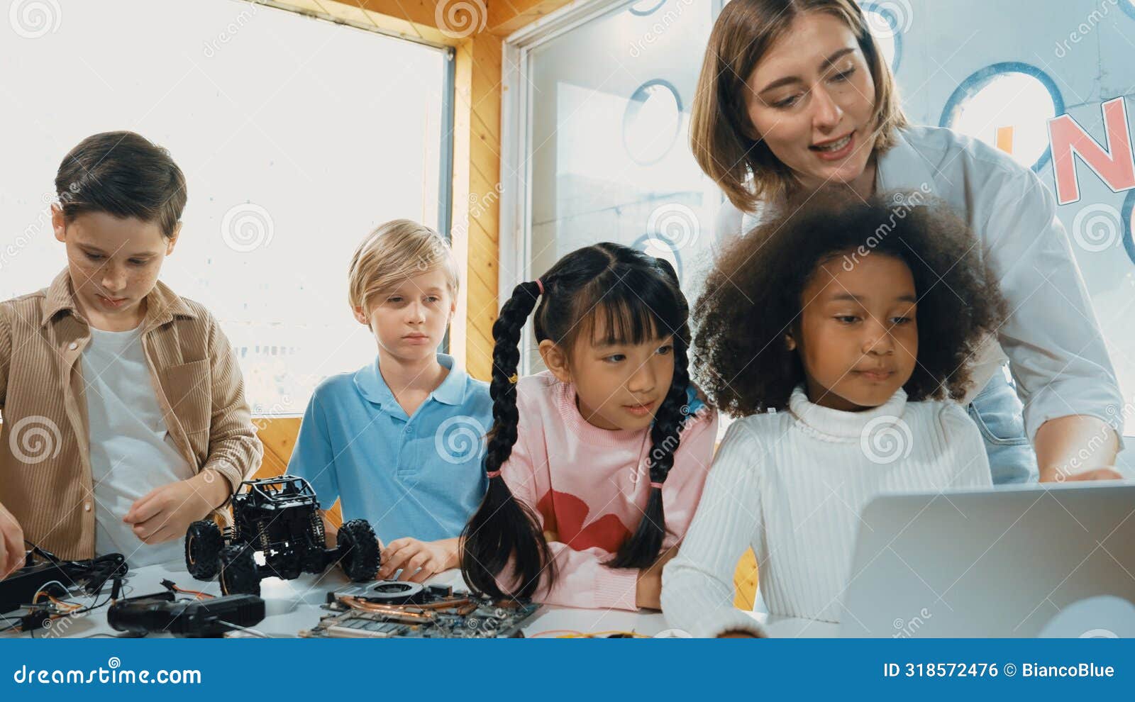 Caucasian Teacher Praised Student while Looking at Learner Work ...