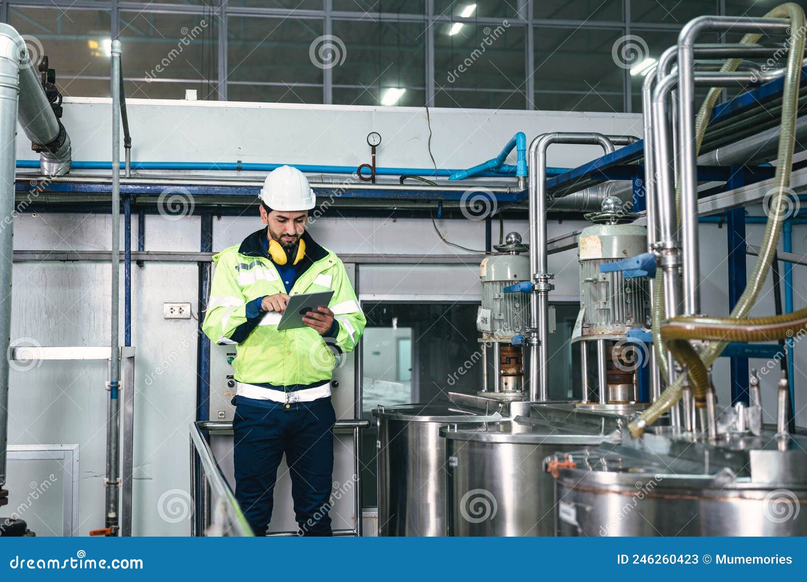 Caucasian Technician Engineer Man in Uniform with Tablet Checking and ...