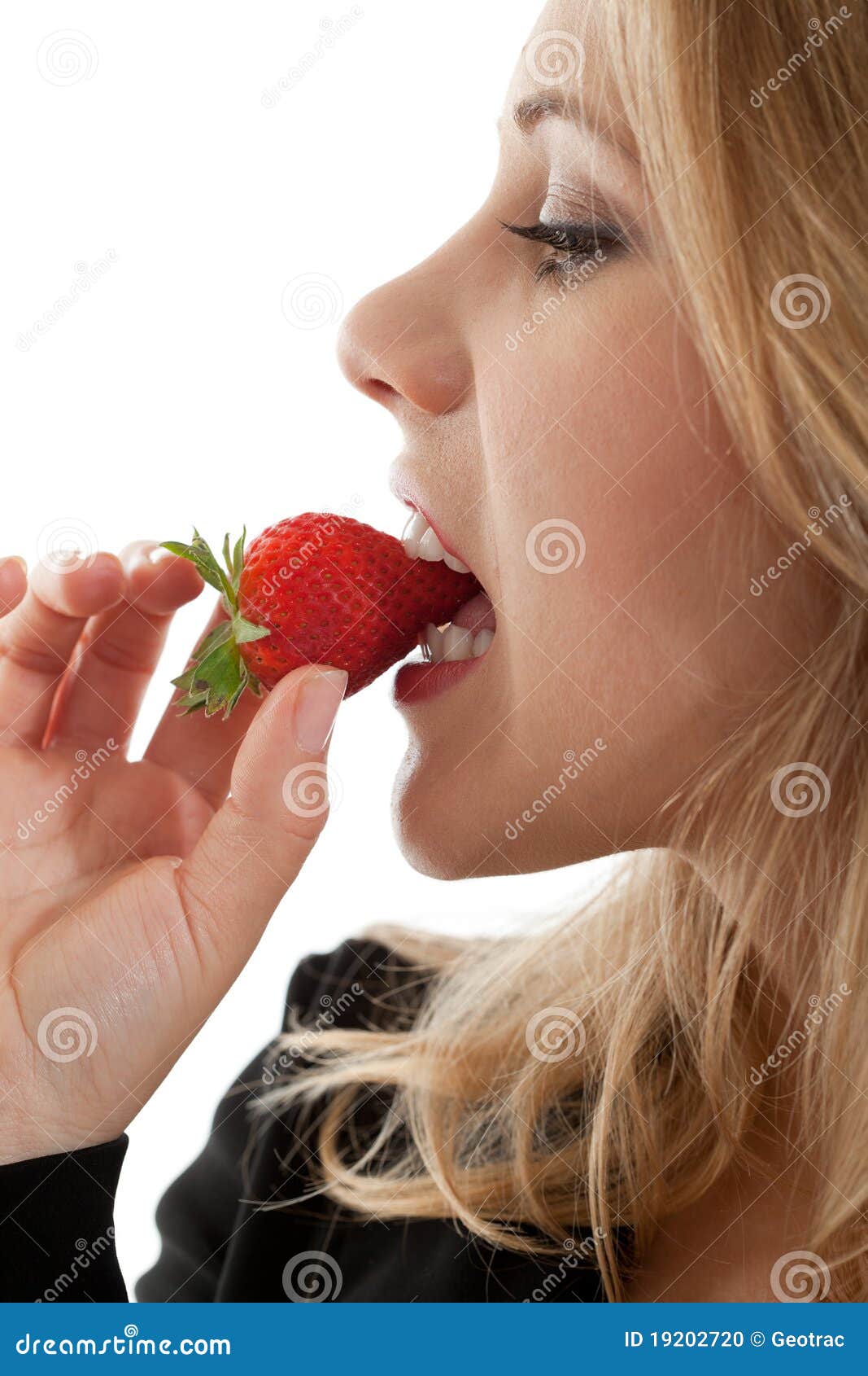 Caucasian Woman Biting Strawberry Stock Photo - Image of twenties ...