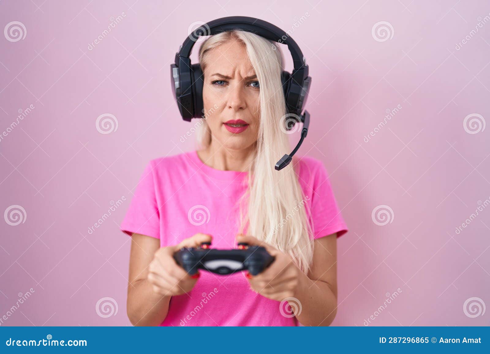 Caucasian Woman Playing Video Game Holding Controller Clueless and ...