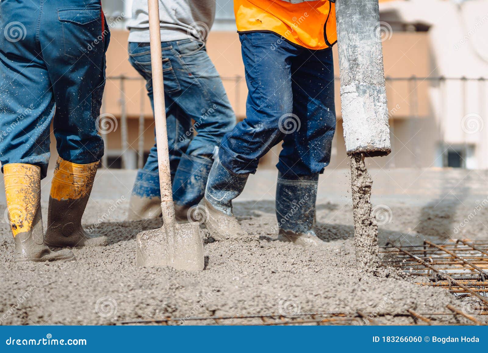Caucasian Workers Pouring Concrete on Slab Concrete Floor Stock Photo ...