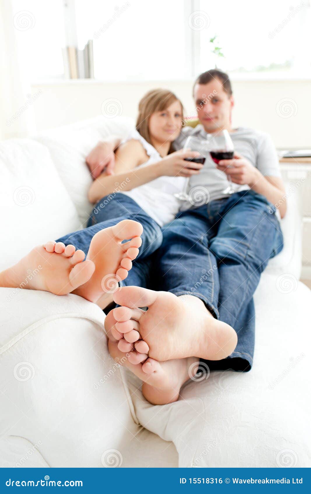 Caucasian Young Couple Drinking Wine on the Sofa Stock Photo - Image of ...