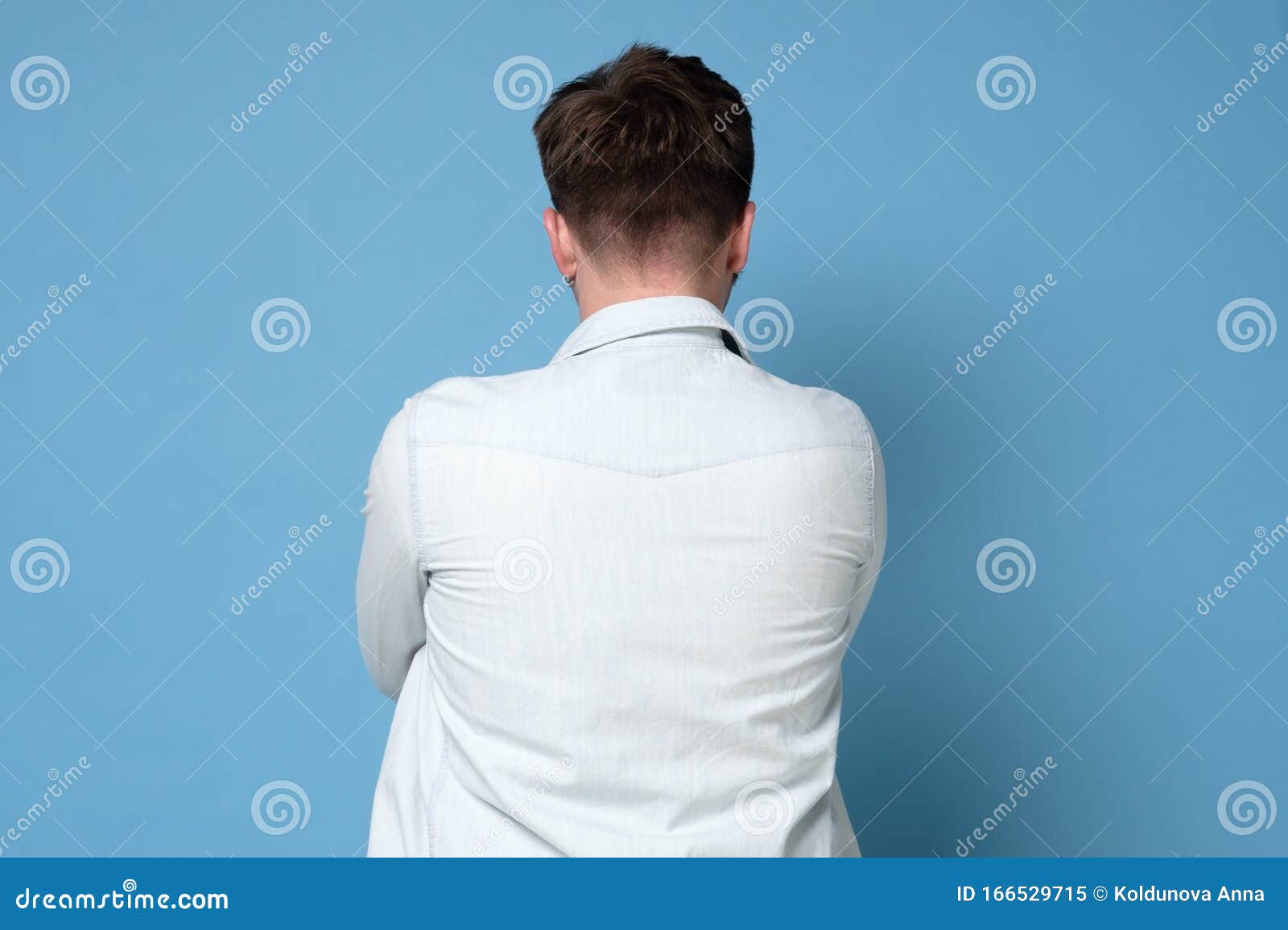 Caucasian Young Man Standing Alone Isolated from Rear View. Stock Image ...