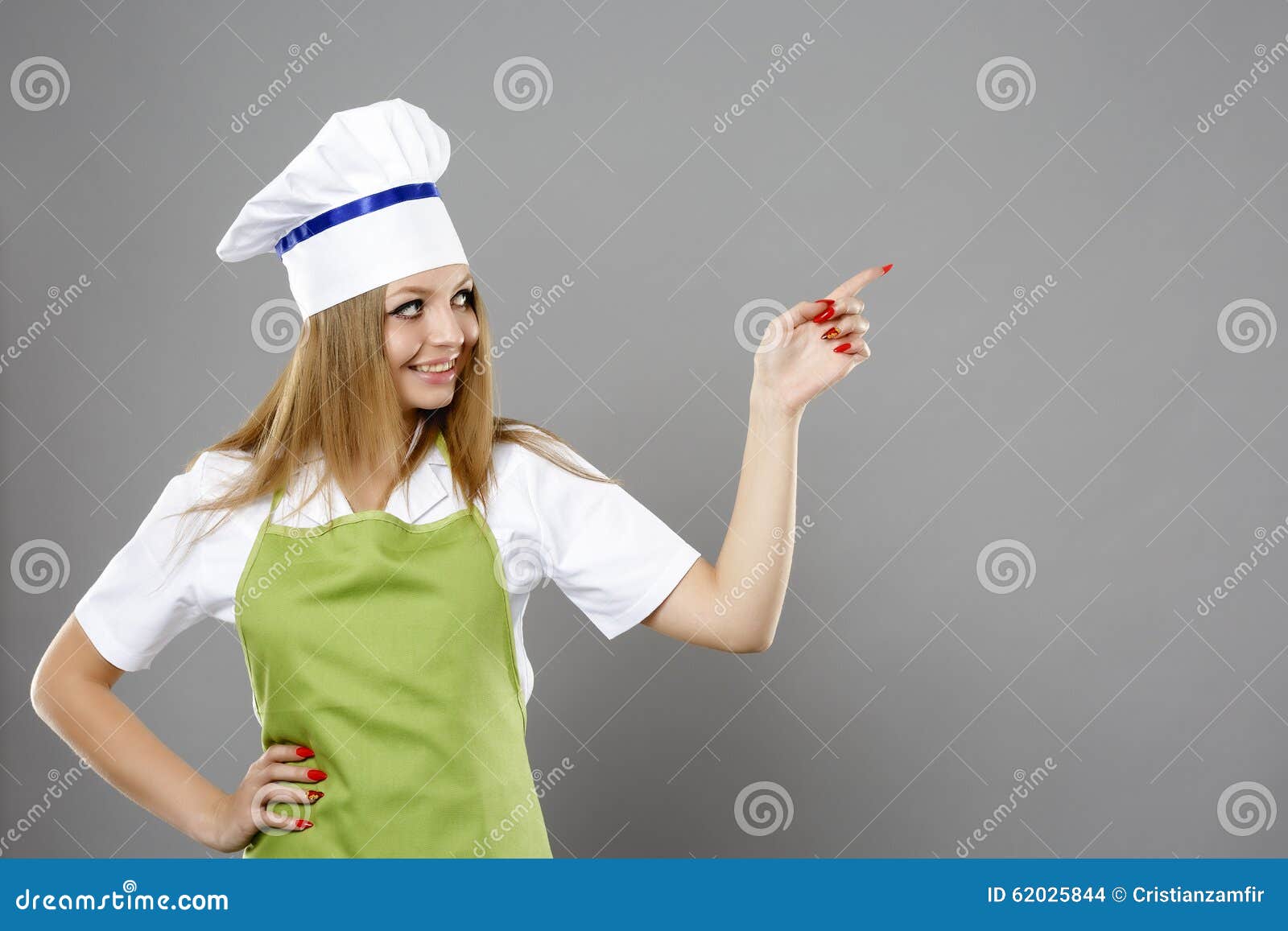 Caucasian Young Woman Chef Pointing Direction Stock Photo - Image of ...