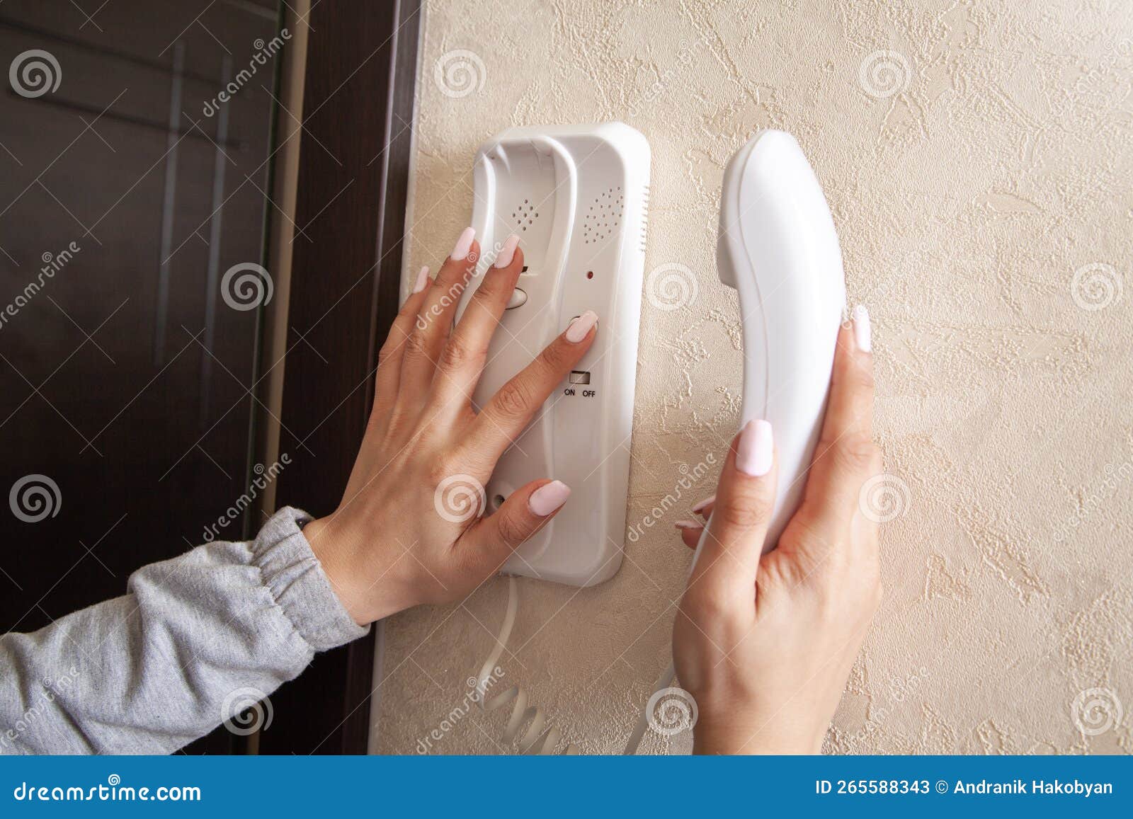 Caucasian Young Woman Holding Intercom Receiver Stock Image - Image of ...