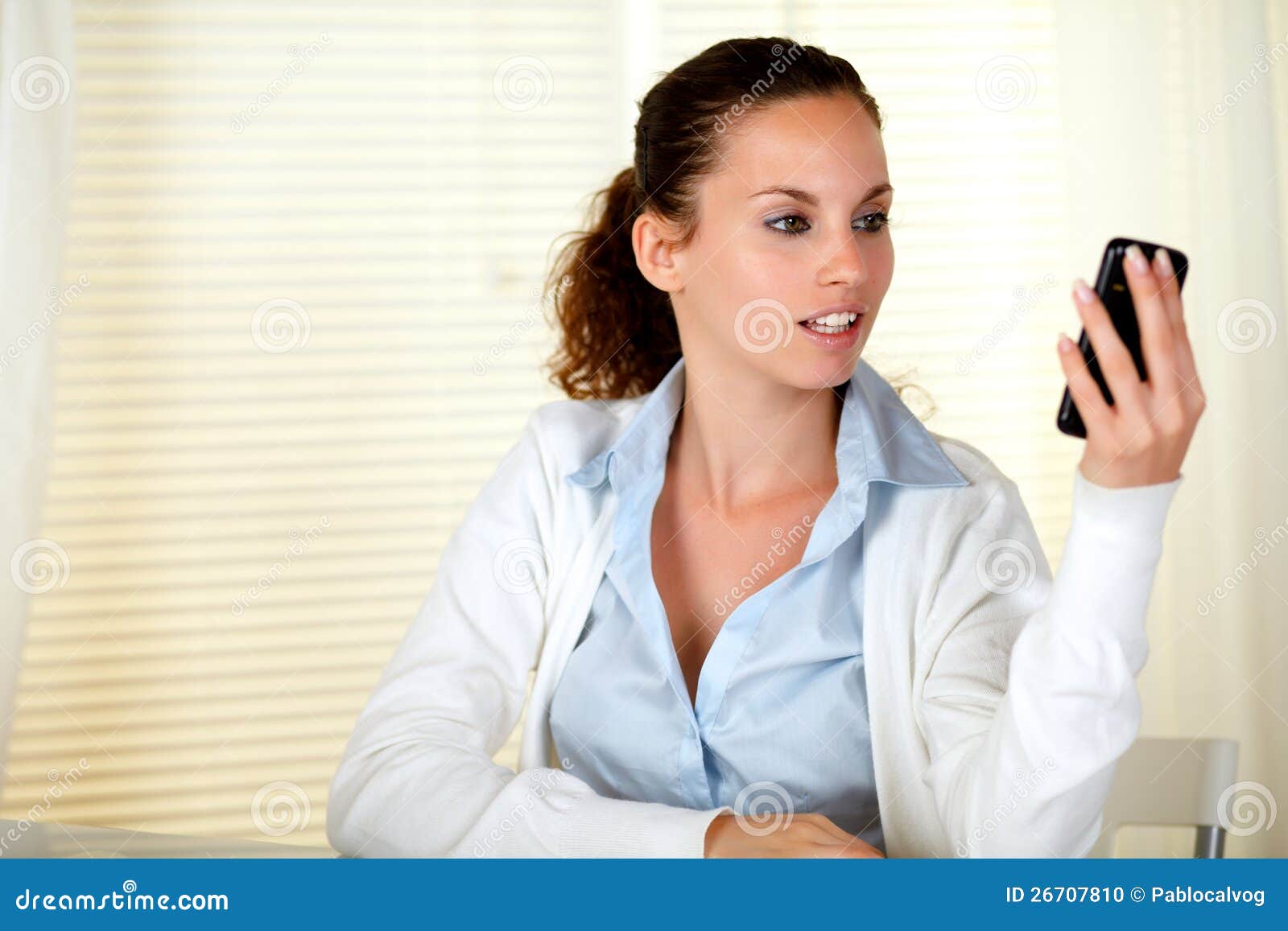 Caucasian Young Woman Reading on Cellphone Stock Photo - Image of ...