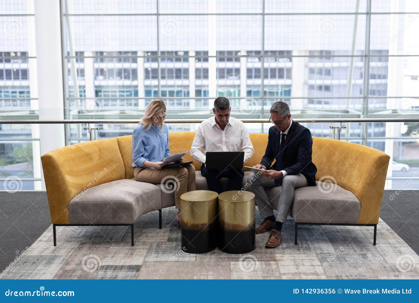 Caucasians Business Executives Working on the Sofa Stock Photo - Image ...