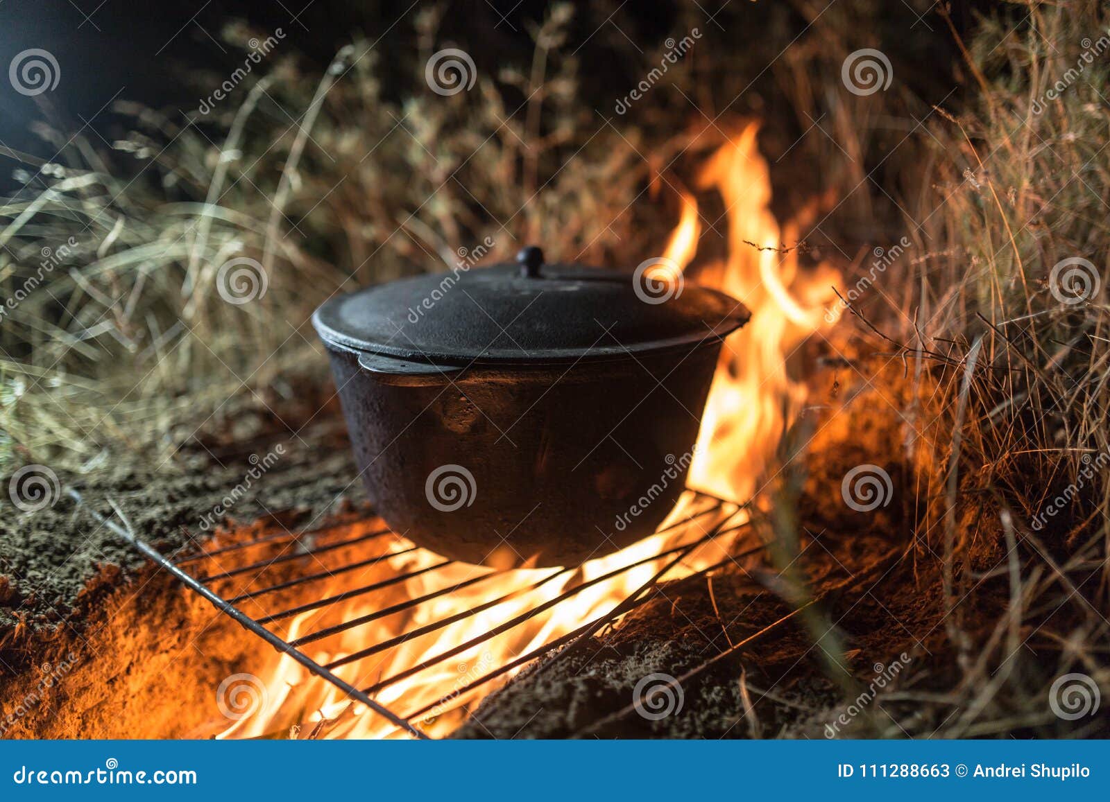 Cauldron on fire at night stock image. Image of tourism - 111288663