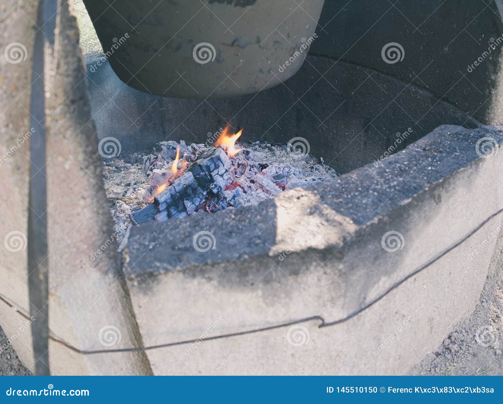 Cauldron Fireplace Closeup stock photo. Image of holiday - 145510150