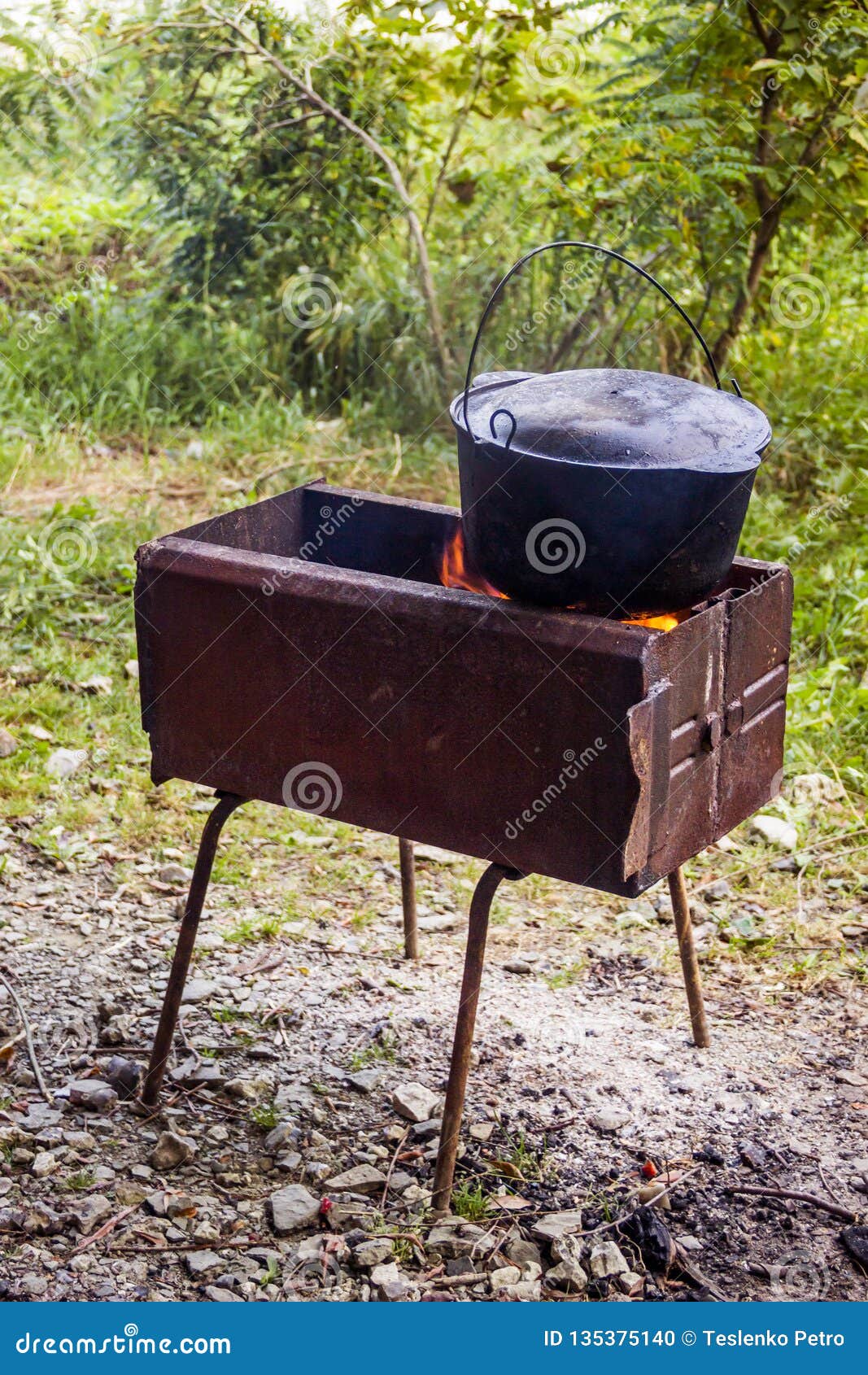 Cauldron on grill stock photo. Image of travel, firewood - 135375140