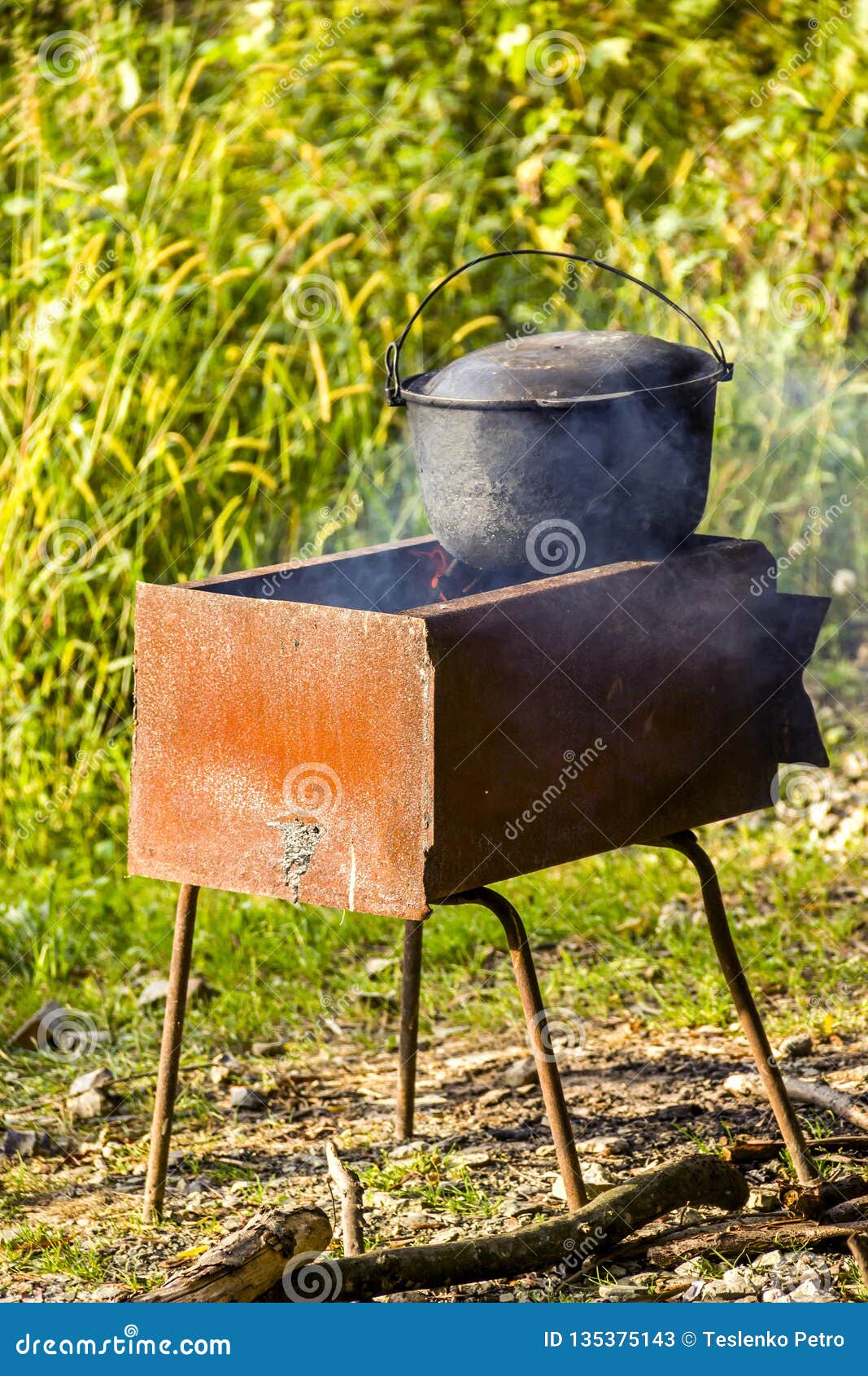 Cauldron on grill stock image. Image of iron, nature - 135375143