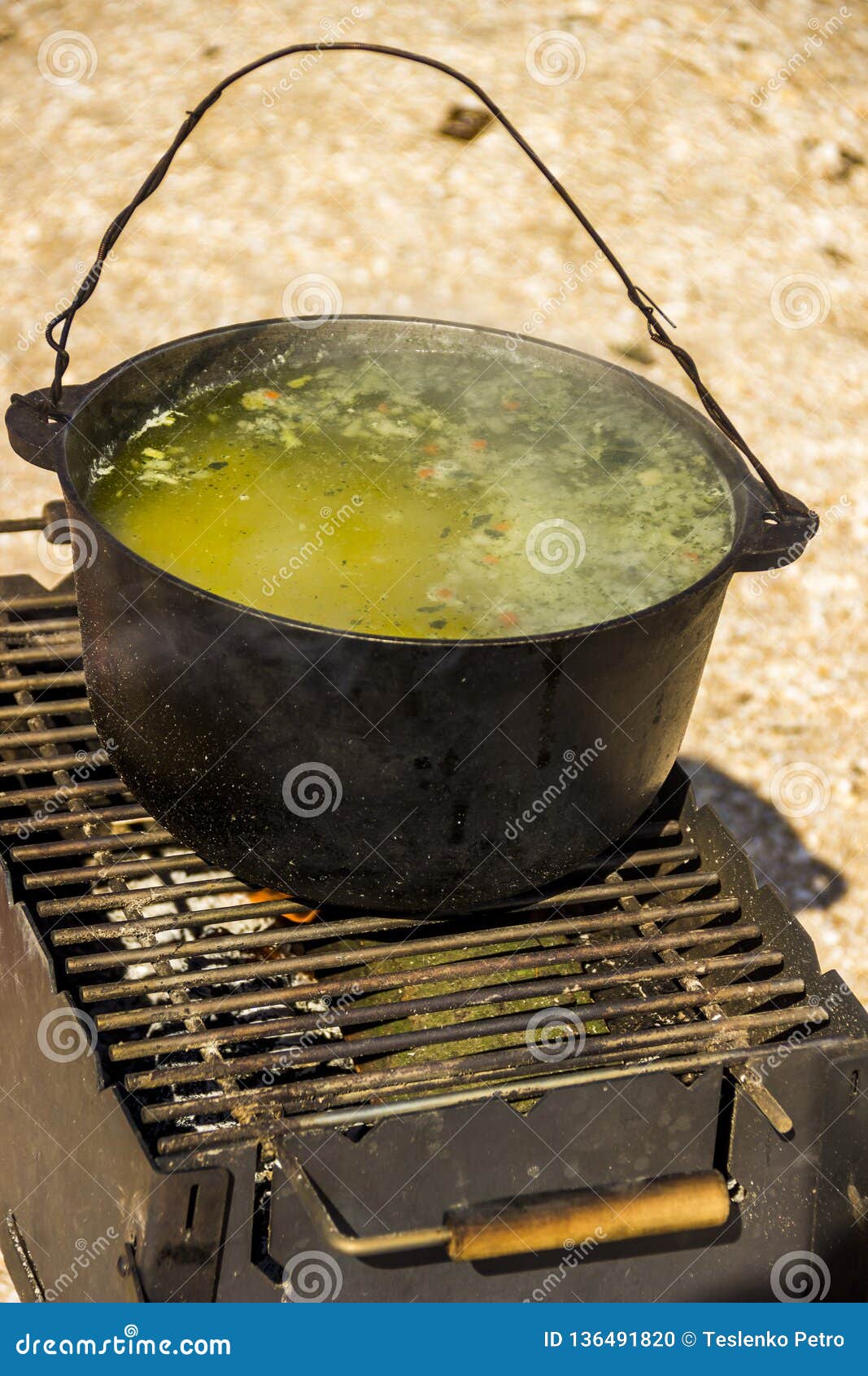 Cauldron of soup stock photo. Image of grill, fire, flame - 136491820
