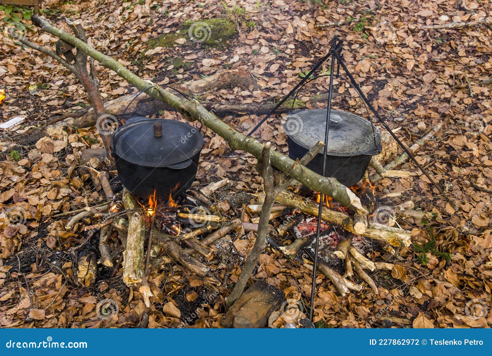 Cauldrons on campfire stock photo. Image of crockery - 227862972