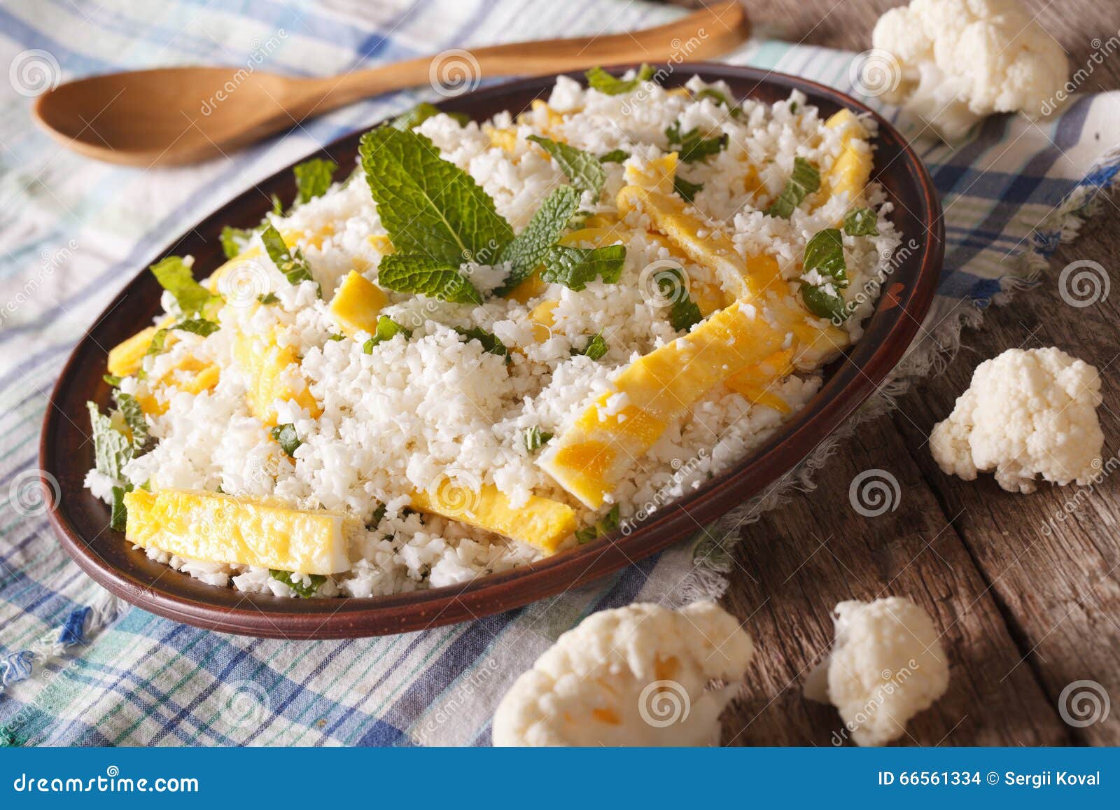 Cauliflower Rice with Scrambled Eggs and Mint Close-up. Horizontal ...