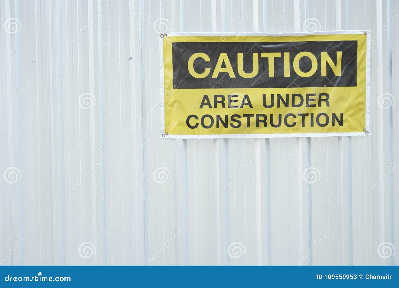 Caution Construction Area Sign on the Wall Stock Image - Image of ...