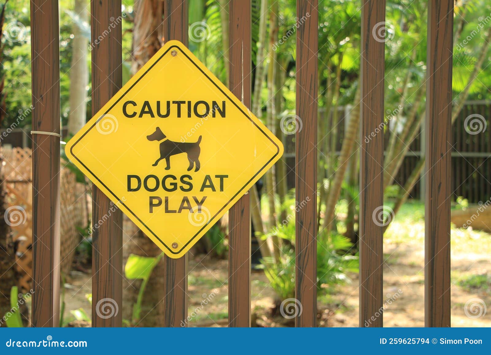 Caution â€“ Dogs at Play Sign Outside a Pet Park Stock Photo - Image of ...