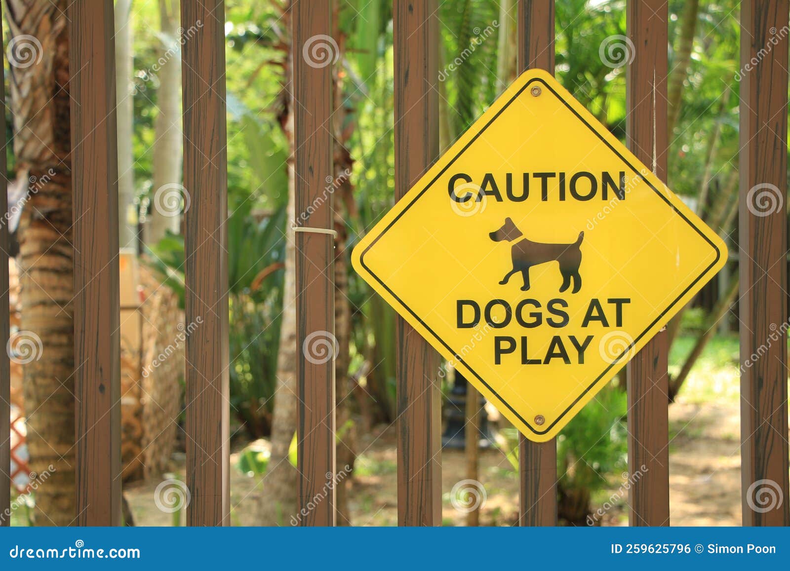 Caution â€“ Dogs at Play Sign Outside a Pet Park Stock Photo - Image of ...