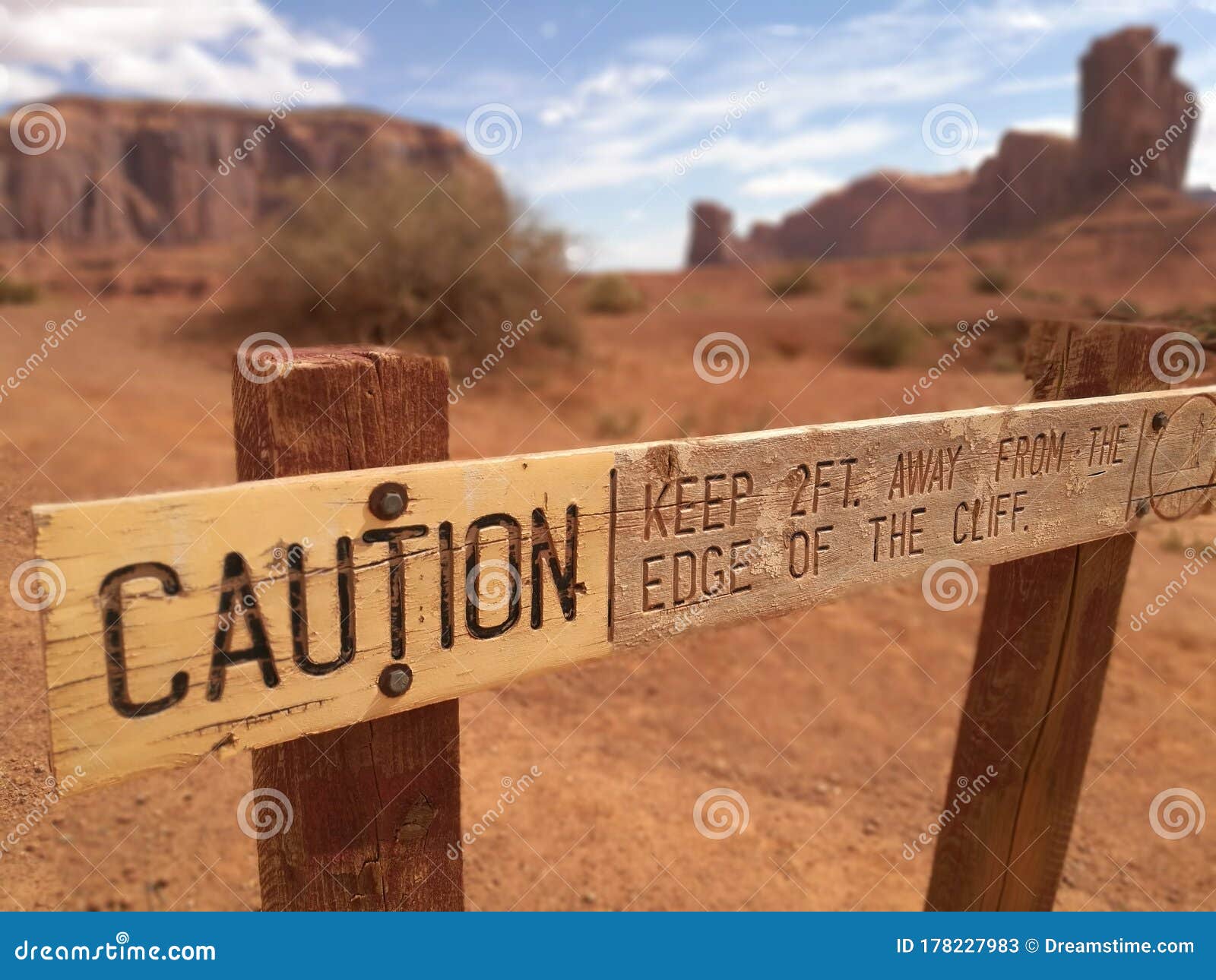 Caution. Keep Away from the Edge of the Cliff. Monument Valley, USA ...