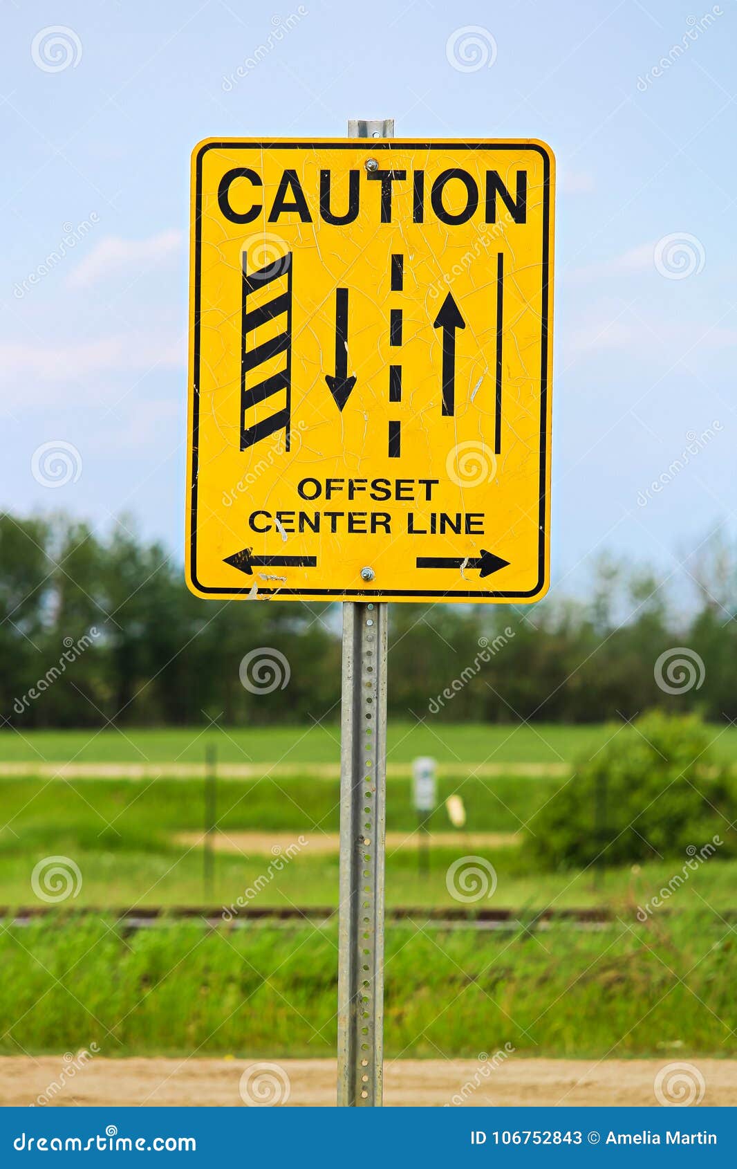 A Caution Offset Center Line Road Sign Stock Image - Image of alberta ...