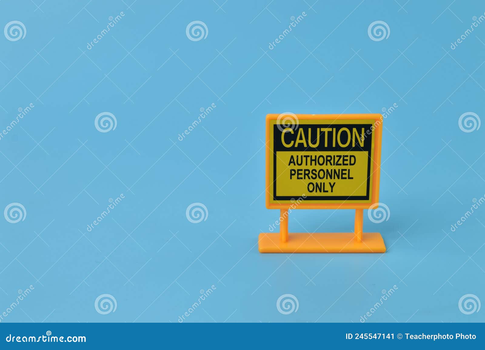 Caution Sign Isolated on a Blue Background Stock Image - Image of ...