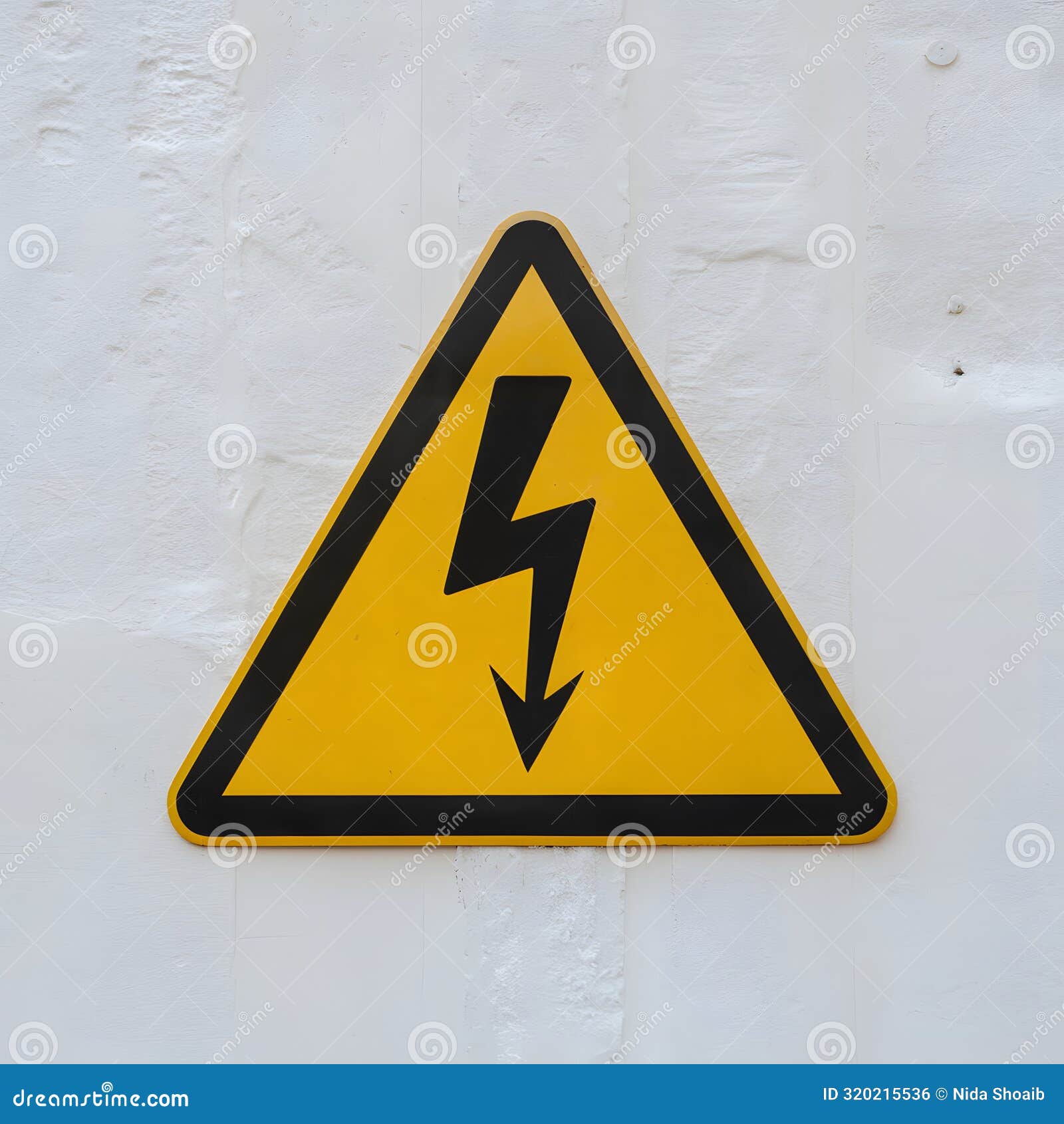 Caution Sign with Yellow Triangle and Black Lightning Bolt Pointing ...