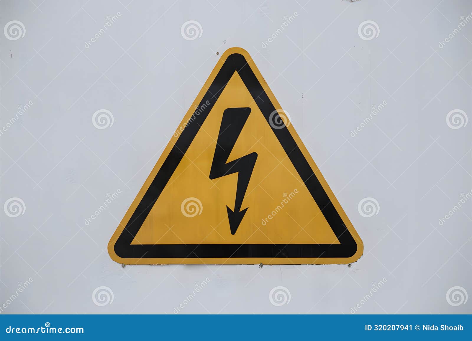 Caution Sign with Yellow Triangle and Black Lightning Bolt Pointing ...