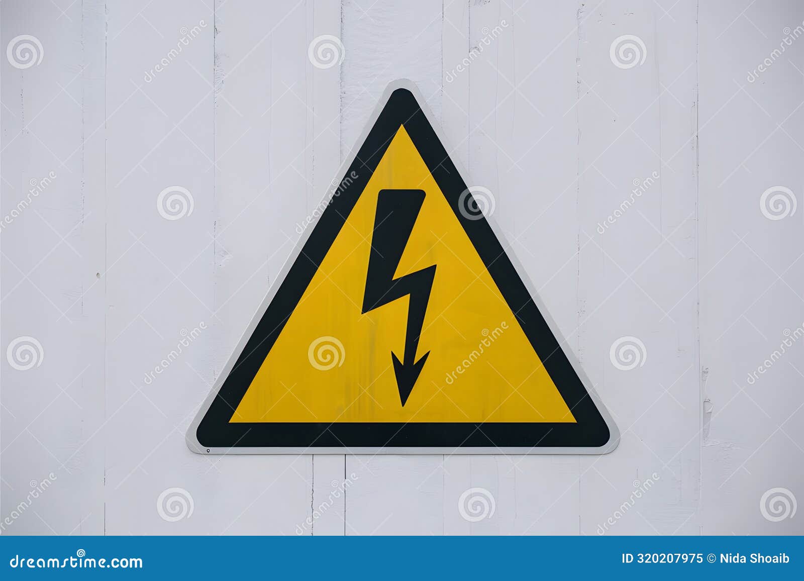 Caution Sign with Yellow Triangle and Black Lightning Bolt Pointing ...