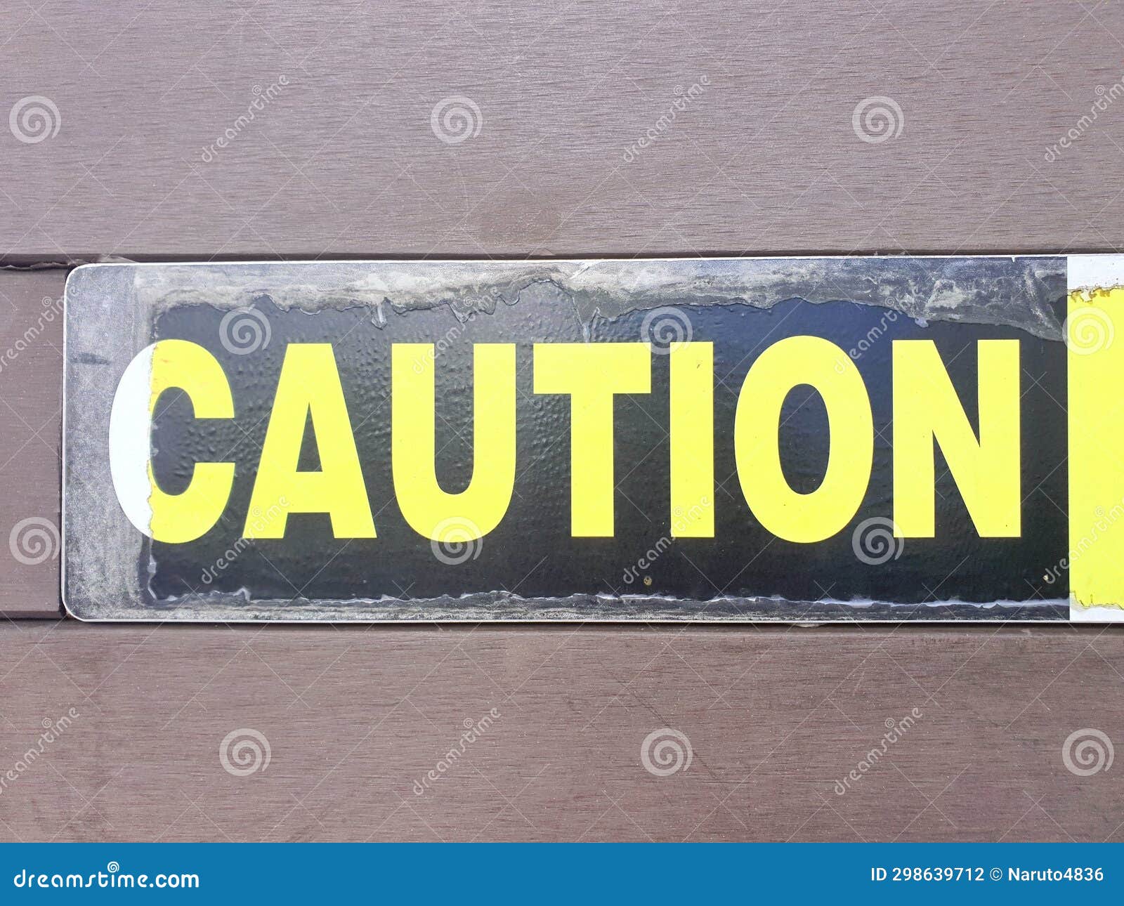 Caution Signage in Yellow Text Stock Photo - Image of warns, closeup ...