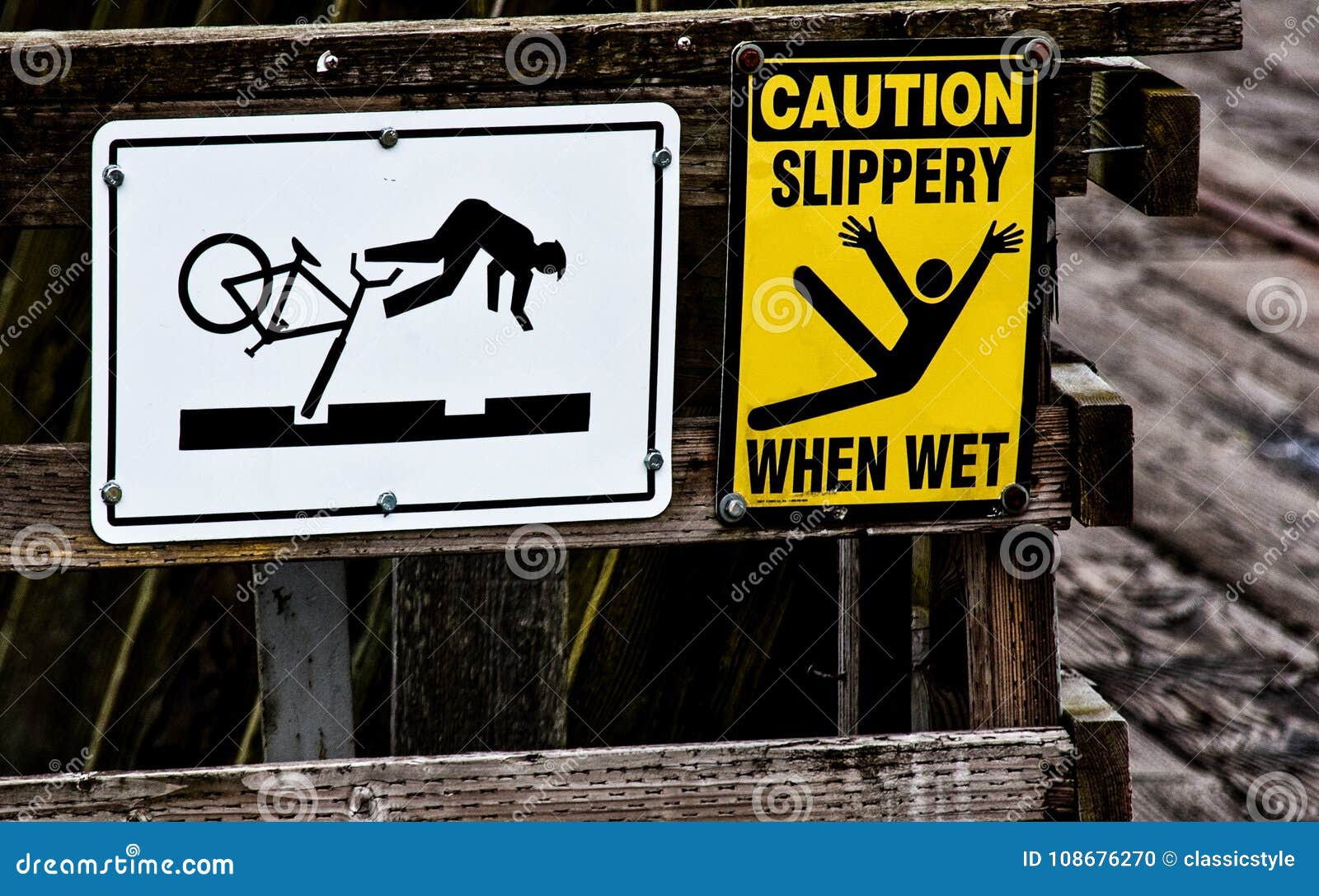2 Caution Signs on a Wooden Rail Stock Photo - Image of sign, attention ...