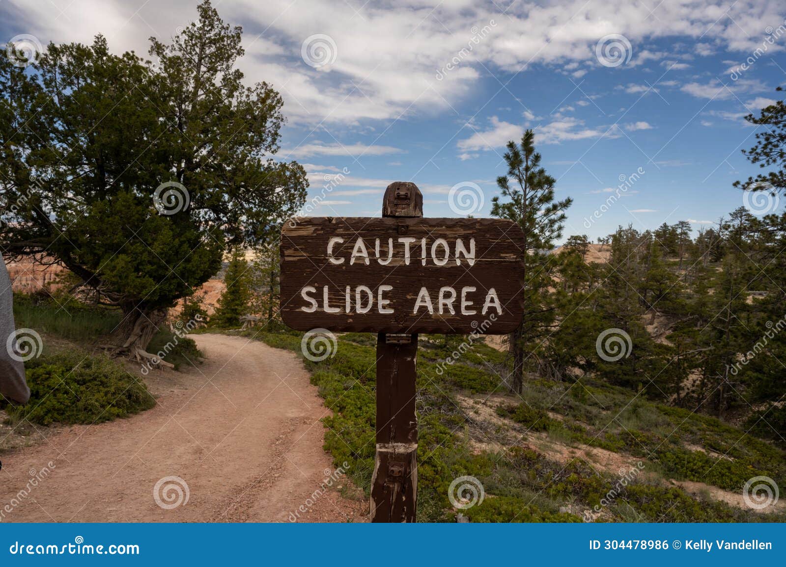 Caution Slide Area Sign in Bryce Stock Photo - Image of orange, cliff ...