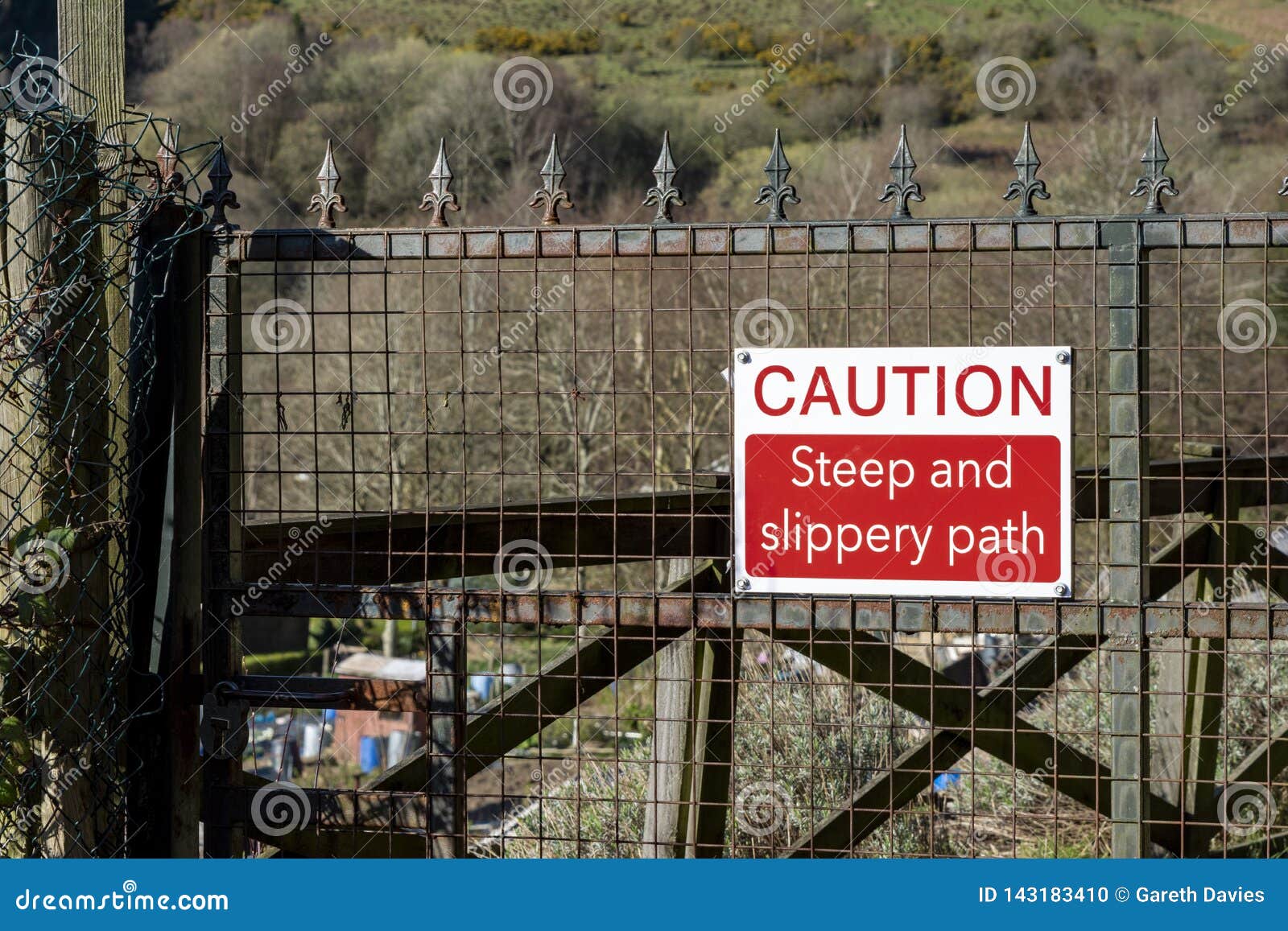 A Caution Steep Hill Sign On A Edge Of A Trail Royalty-Free Stock Image ...