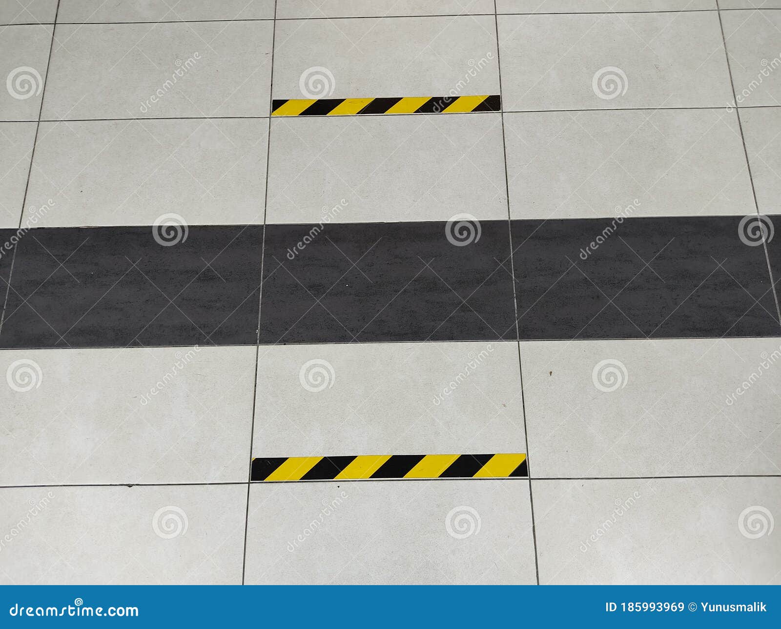 Caution Sticker on the Floor for Social Distancing Practice. Stock ...
