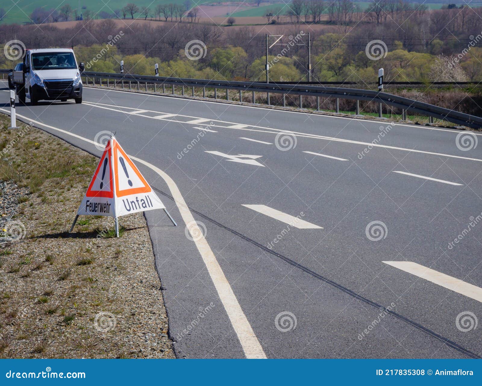 Caution Traffic Accident Sign on the Roadside Stock Photo - Image of ...