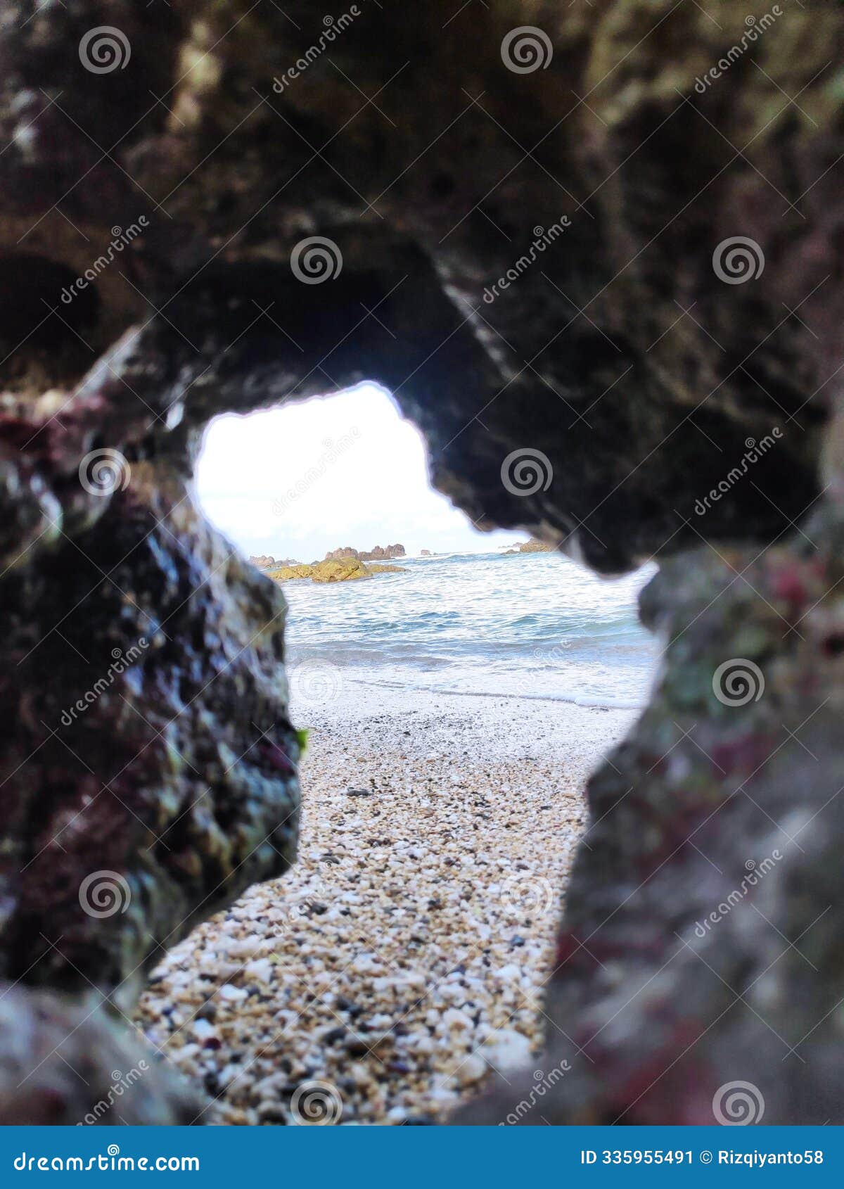 Cave on the beach stock image. Image of cave, sand, water - 335955491