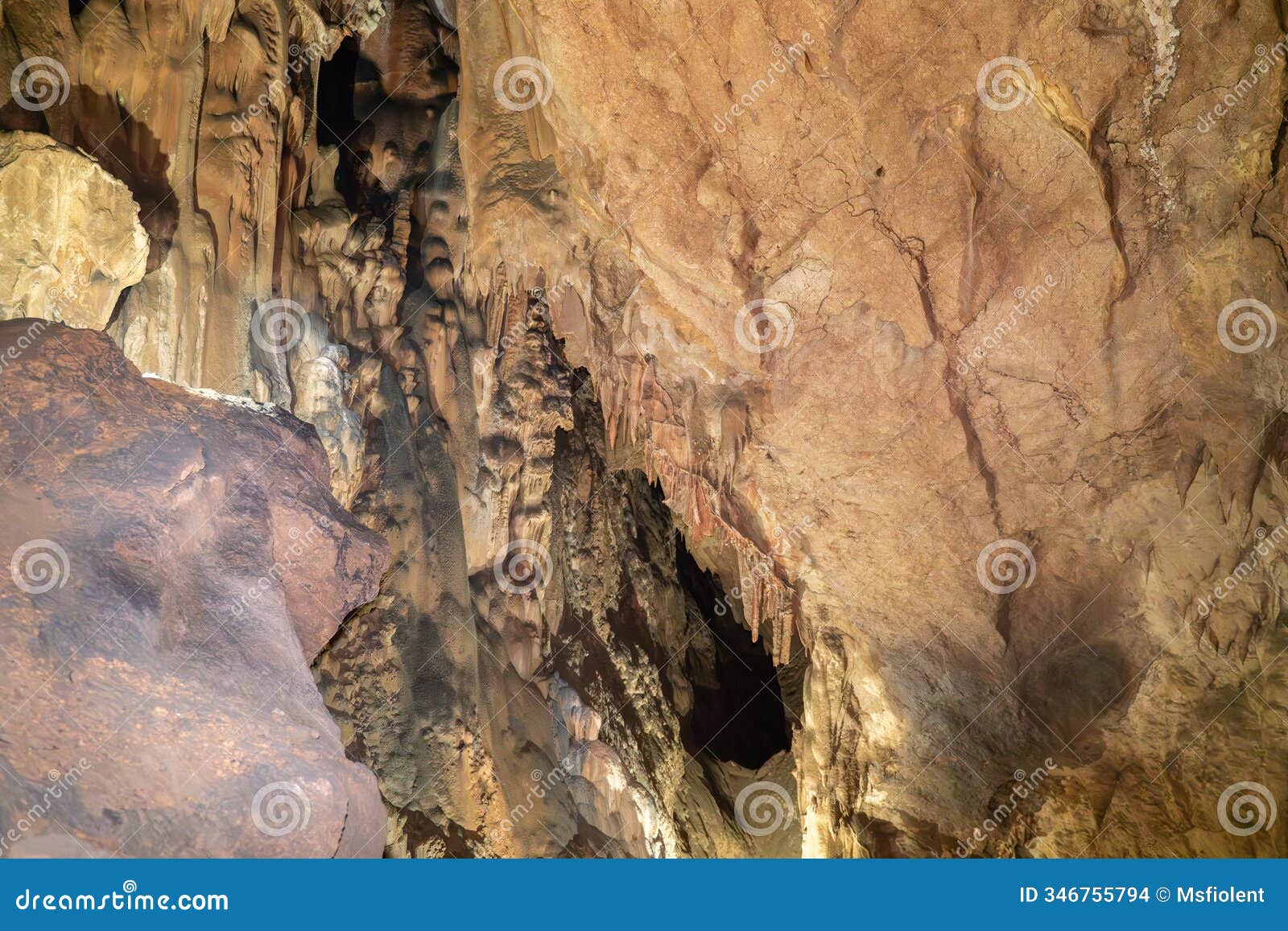 A Cave with a Brown Ceiling and a Brown Floor. the Cave is Dark and Has ...