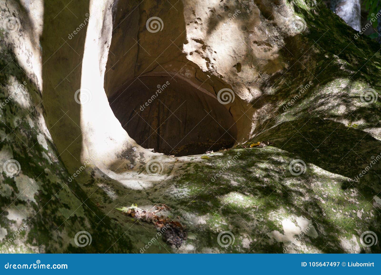 Cave carved inside a rock stock image. Image of nature - 105647497
