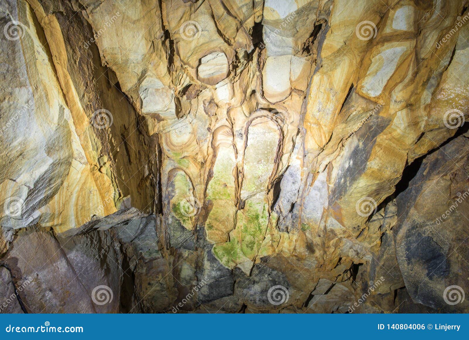 The Cave in the Cliff Close-up Stock Photo - Image of hole, beautiful ...