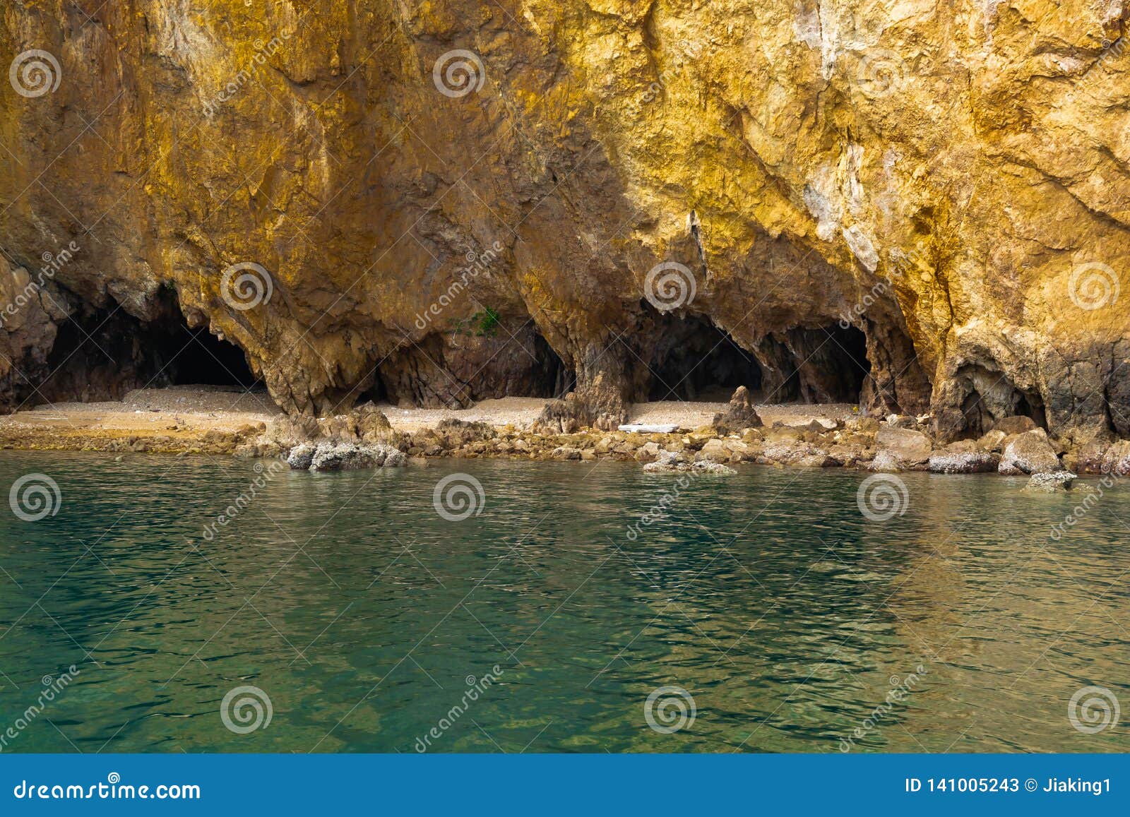 Cave on Cliff Island and Sea Stock Image - Image of seascape, cliff ...