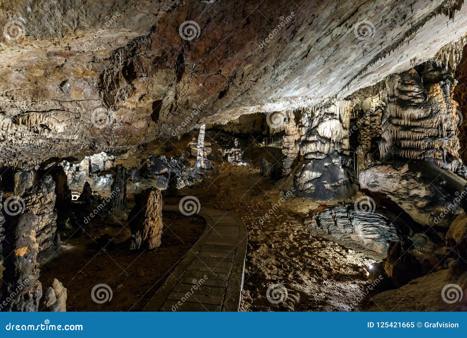 Cave with Concrete Footpath Stock Image - Image of structure ...