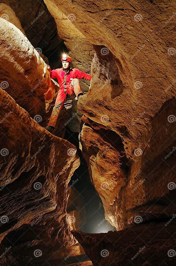 Cave explorer in action stock photo. Image of meander - 17536716