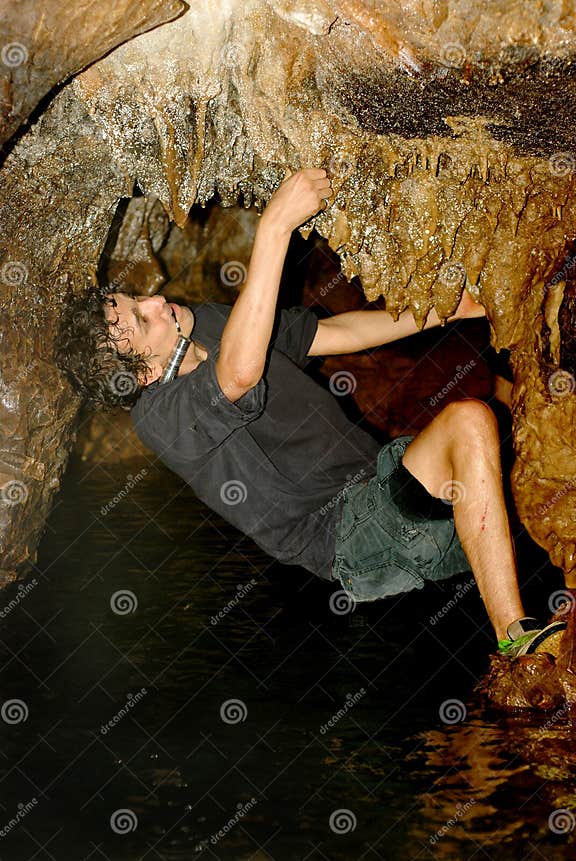 Cave exploring stock photo. Image of lamp, limestone - 15453588