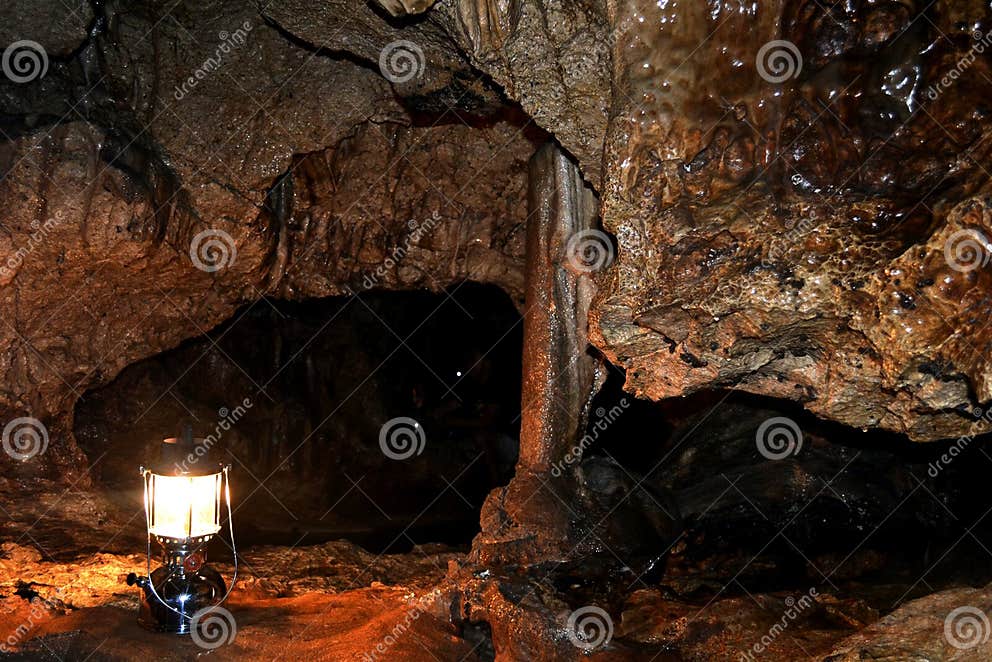 Cave with lamp stock image. Image of natural, rock, deep - 54853455