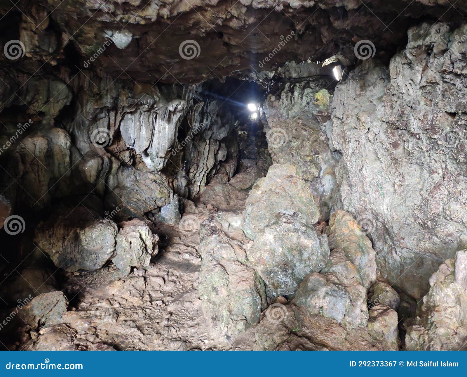 Exploring the Enchanting Cave S Natural Illumination Amid Majestic ...